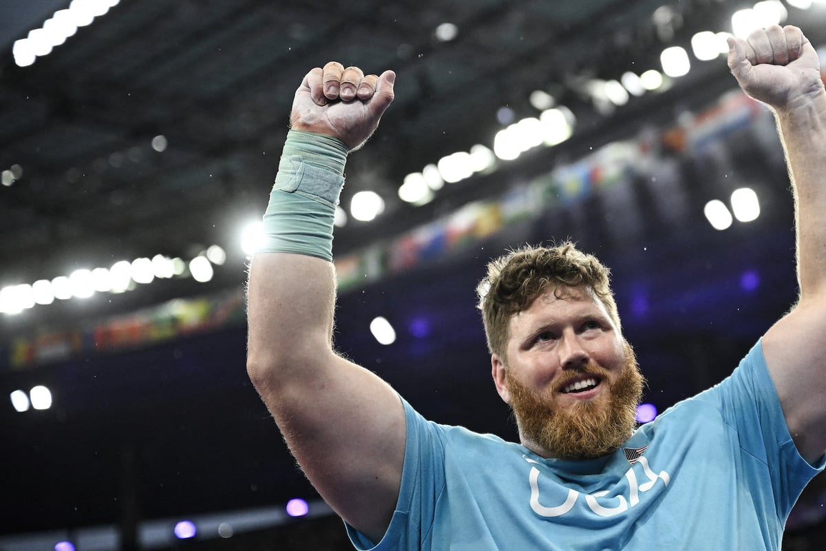 USA's Ryan Crouser wins record third consecutive Olympic shot put gold