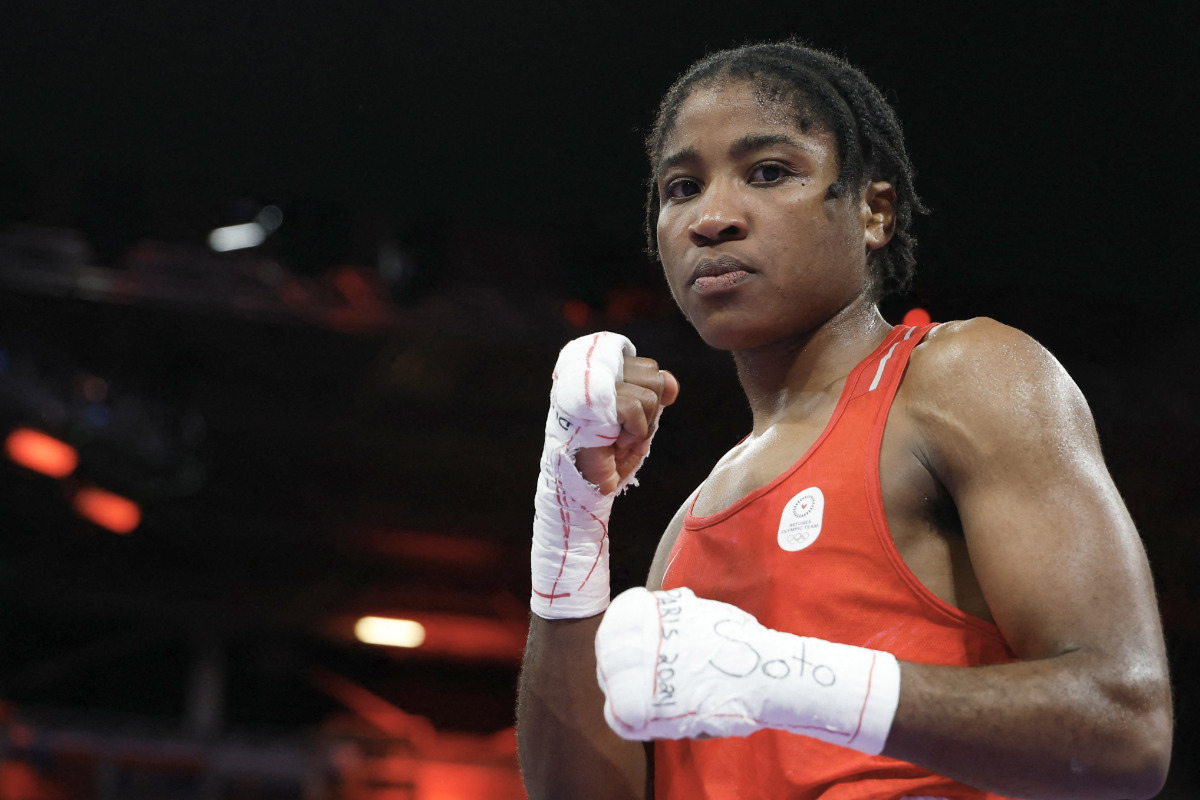 Paris Olympics: Boxer Cindy Ngamba locks down Refugee Team's first-ever ...