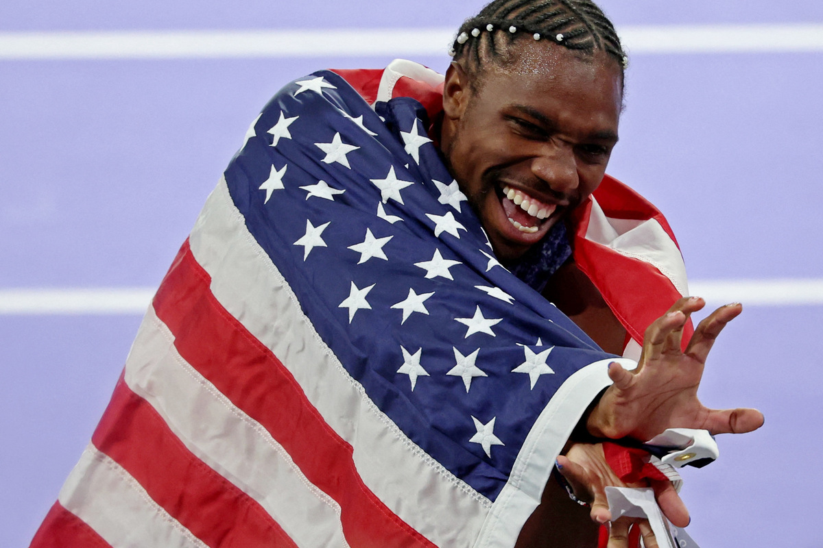 Noah Lyles hailed as hero in Japan for celebration after historic 100 ...