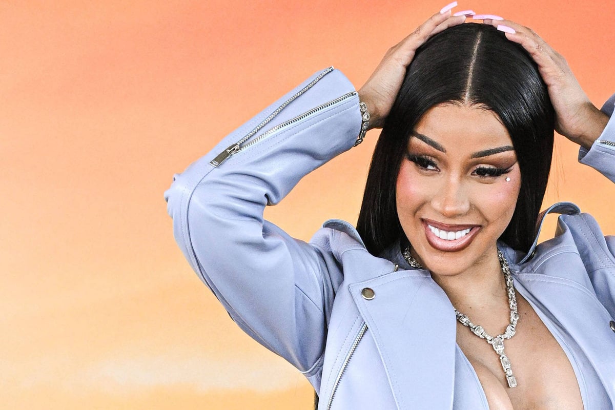 Cardi B twerks and gives fans shots at the 2025 Revolve Festival!