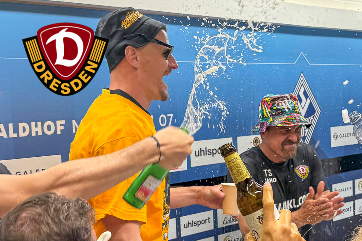 Schlapphut und Bierdusche: Thomas Stamm feiert Dynamos Aufstieg mit den Spielern