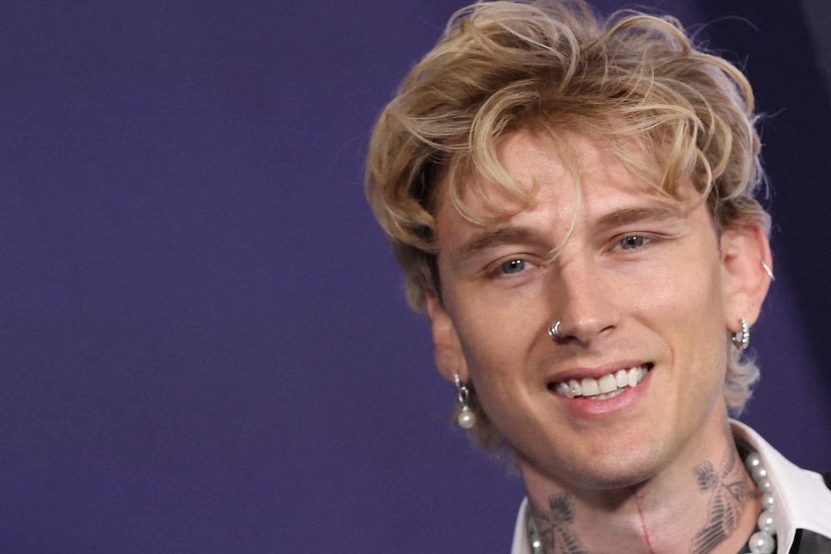 Machine Gun Kelly gushes over newborn baby with Megan Fox on AMAs red ...