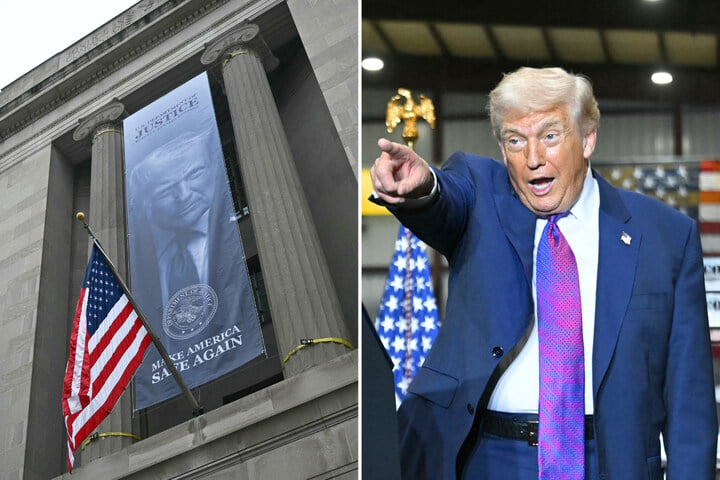 Trump hangs giant ominous banner of his face on Justice Dept building ...