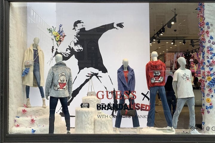Banksy encourages fans to shoplift at Guess store due to artwork display