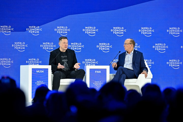 Elon Musk promises humanoid robots for all at Davos debut